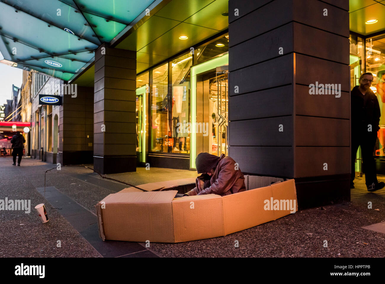 Homeless man, cardboard boat, Granville Street, Vancouver, British ...