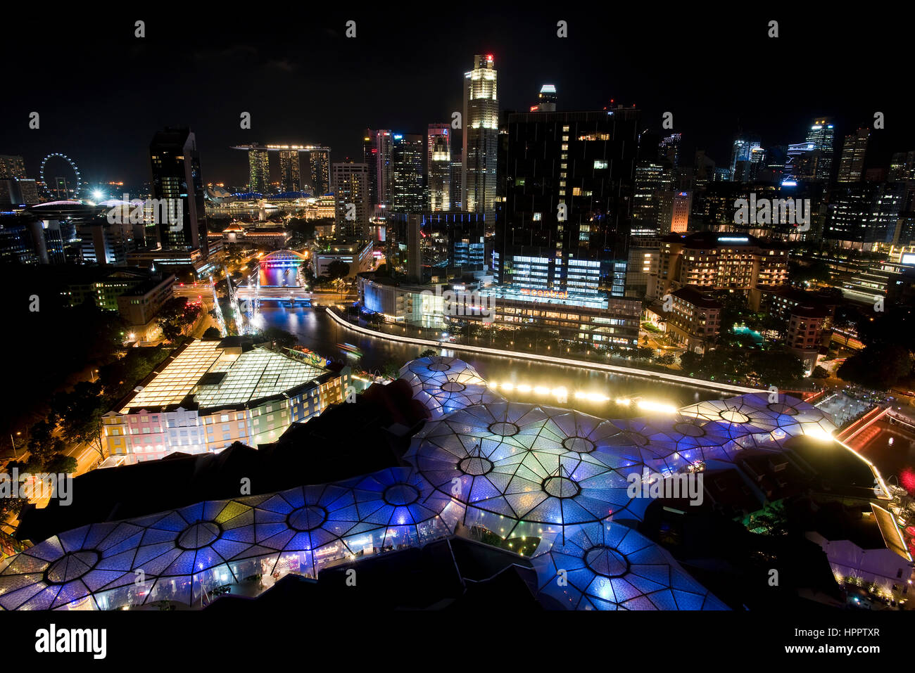 A night view cityscape of the Clarke Quay area Singapore skyline at ...
