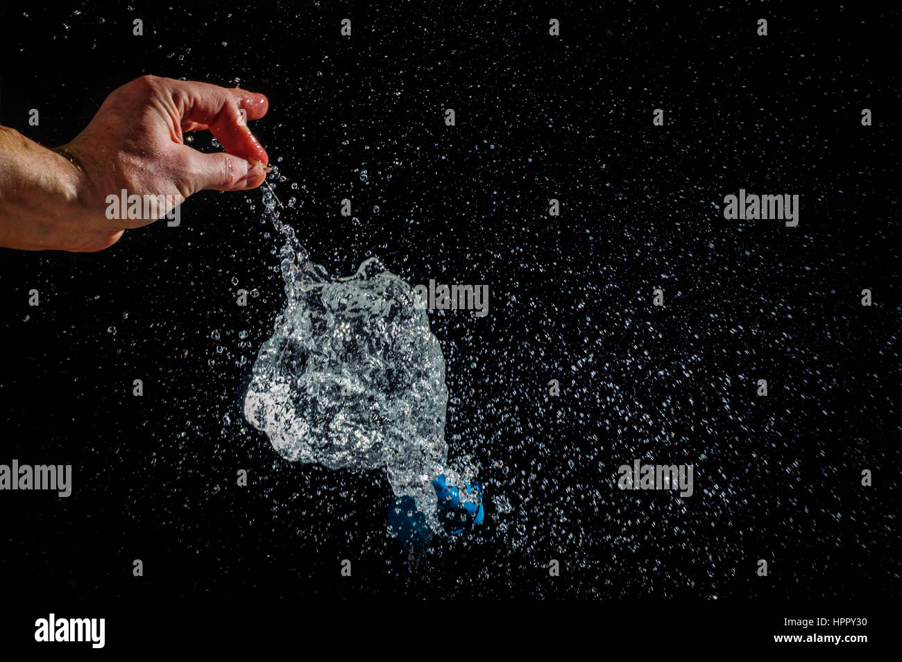 Water balloon burst hi-res stock photography and images - Alamy