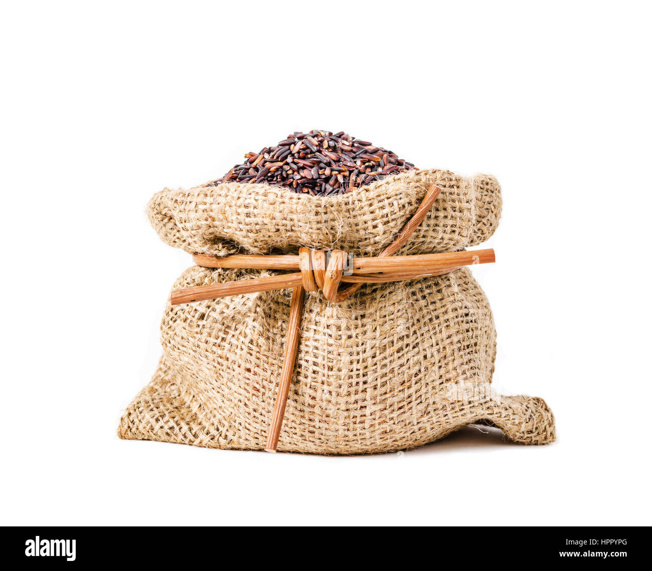 Thai black jasmine rice or Rice berry in sack bag isolated on white ...