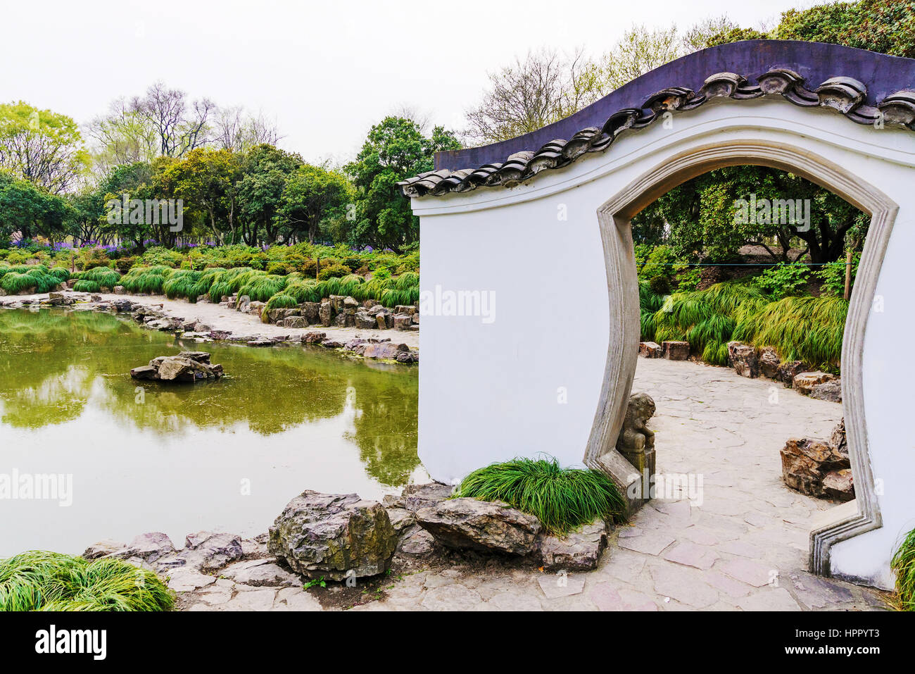 peaceful Chinese garden with pond Stock Photo - Alamy