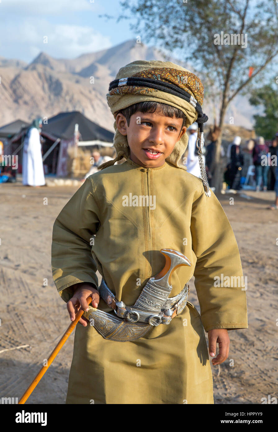 Muscat, Oman, February 4th, 2017: young omani boy in traditional ...