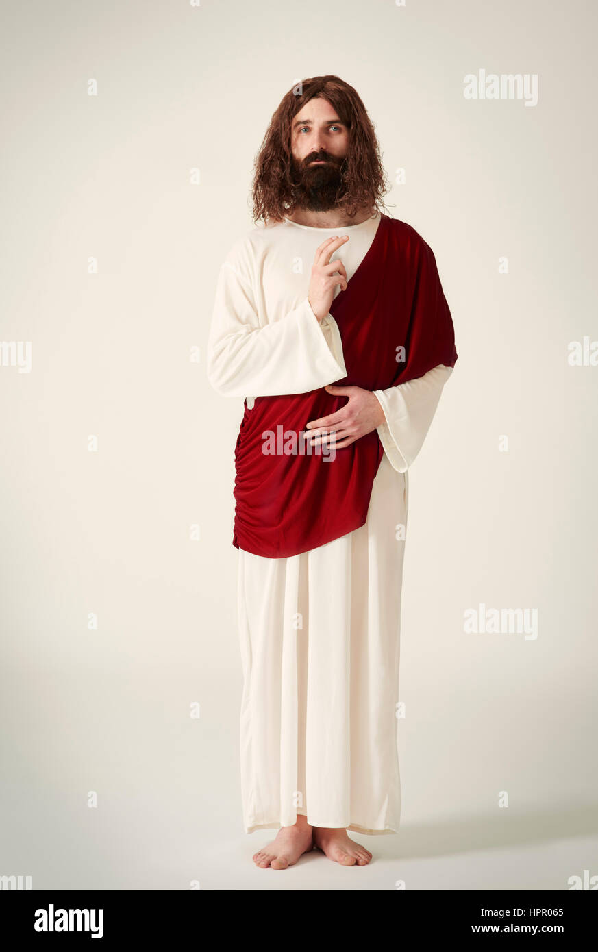 Man holding sign jesus christ hi-res stock photography and images - Alamy