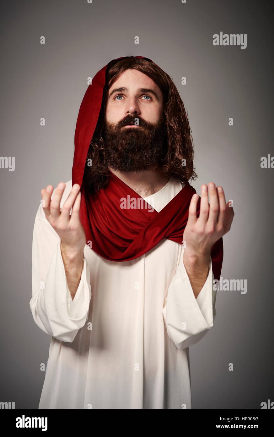 Man holding sign jesus christ hi-res stock photography and images - Alamy
