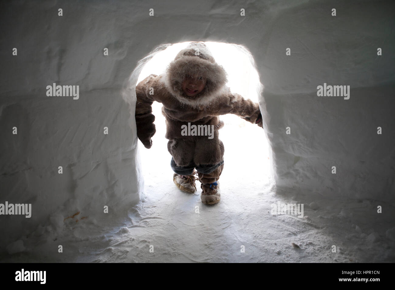 Inuit boy on the North Pole Stock Photo - Alamy