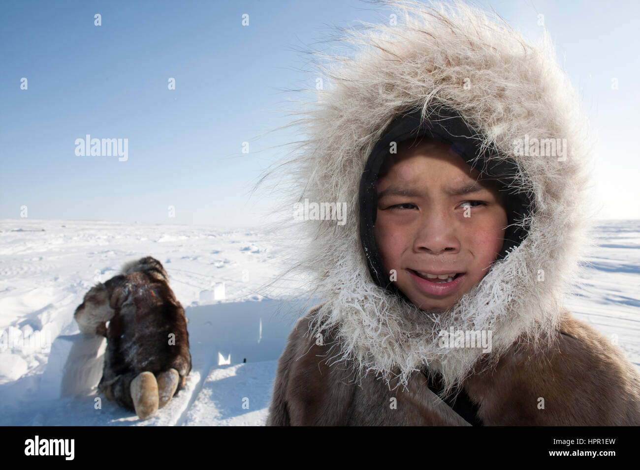 Inuit boy on the North Pole Stock Photo - Alamy