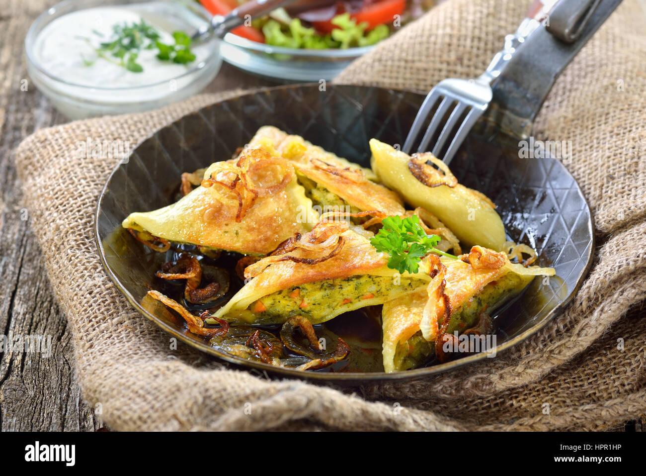 Fried Swabian ravioli (so called 'Maultaschen') with vegetable filling ...