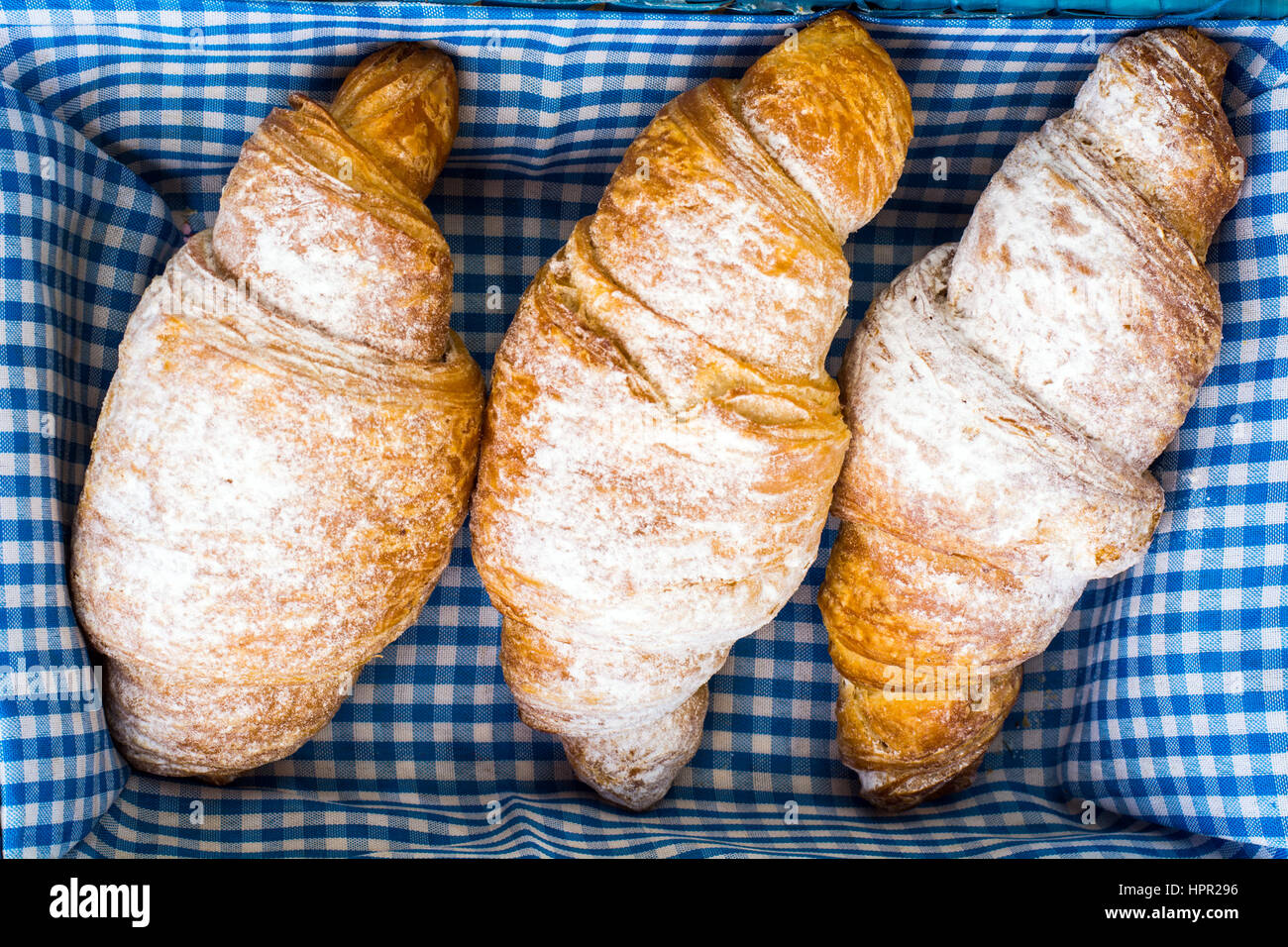 Delicious crispy croissants in bread basket. Studio Photo Stock Photo ...