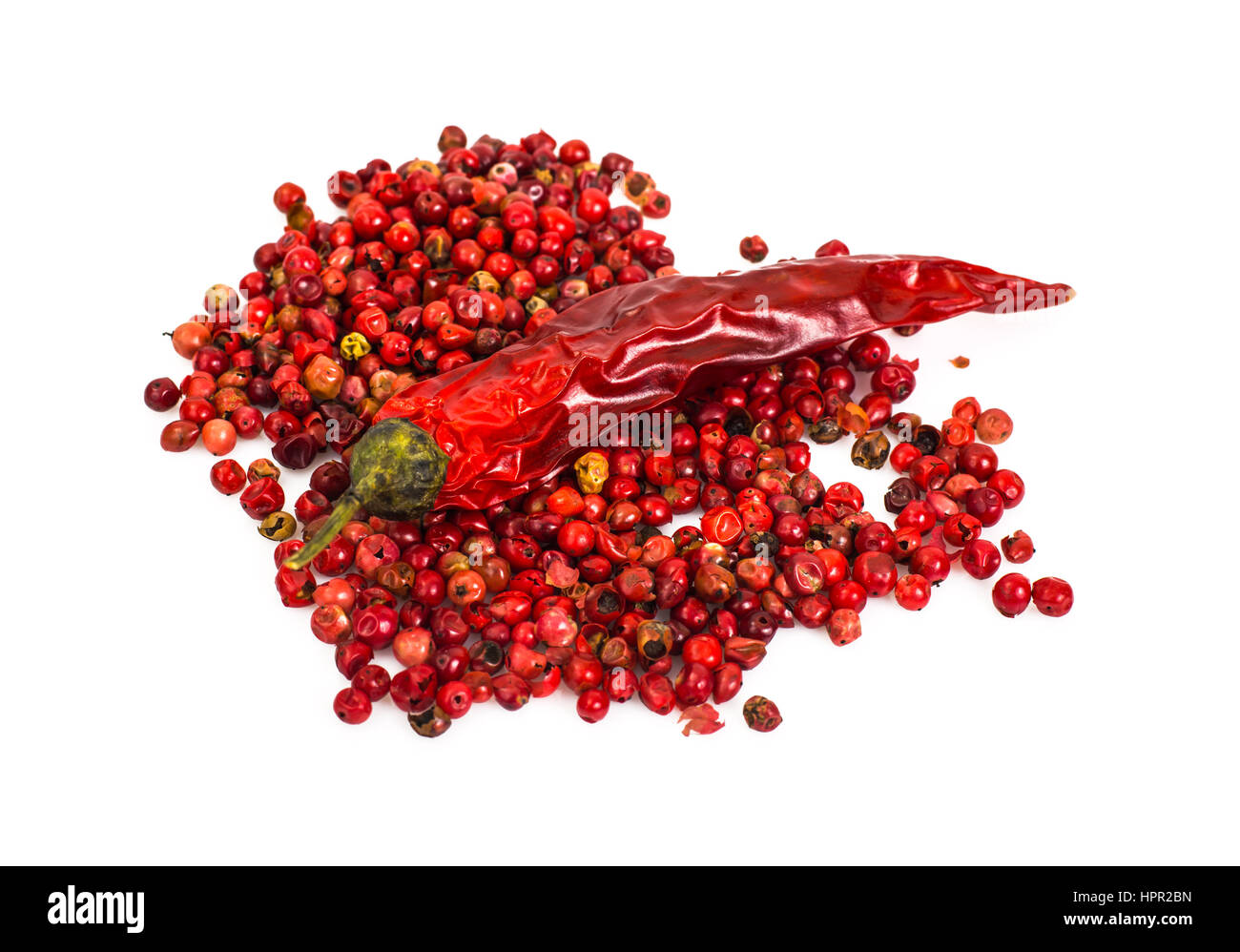 Spicy Spice Pink pepper peas on white background. Studio photo Stock ...
