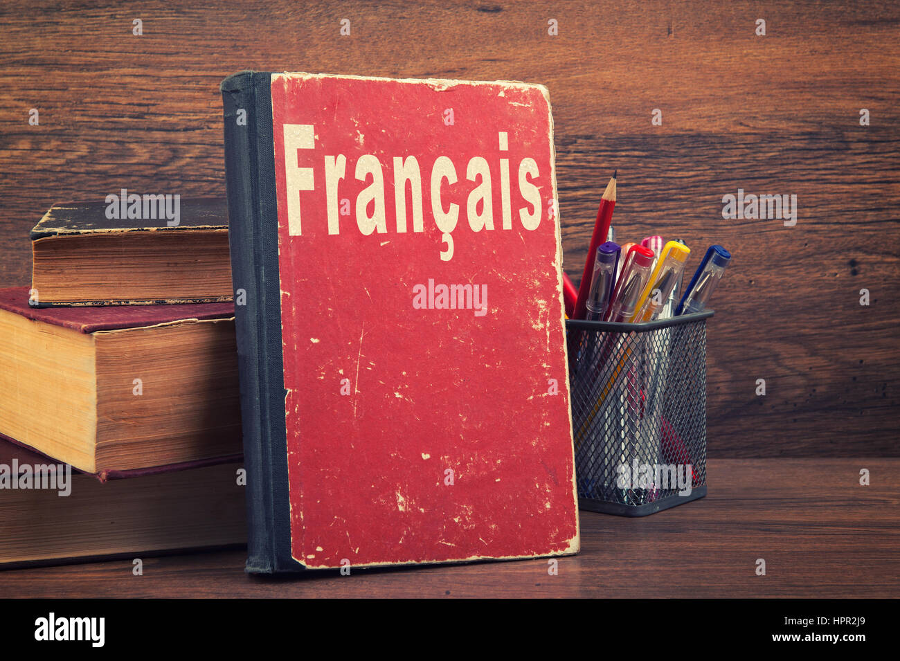 learning French concept. book on a wooden background Stock Photo - Alamy