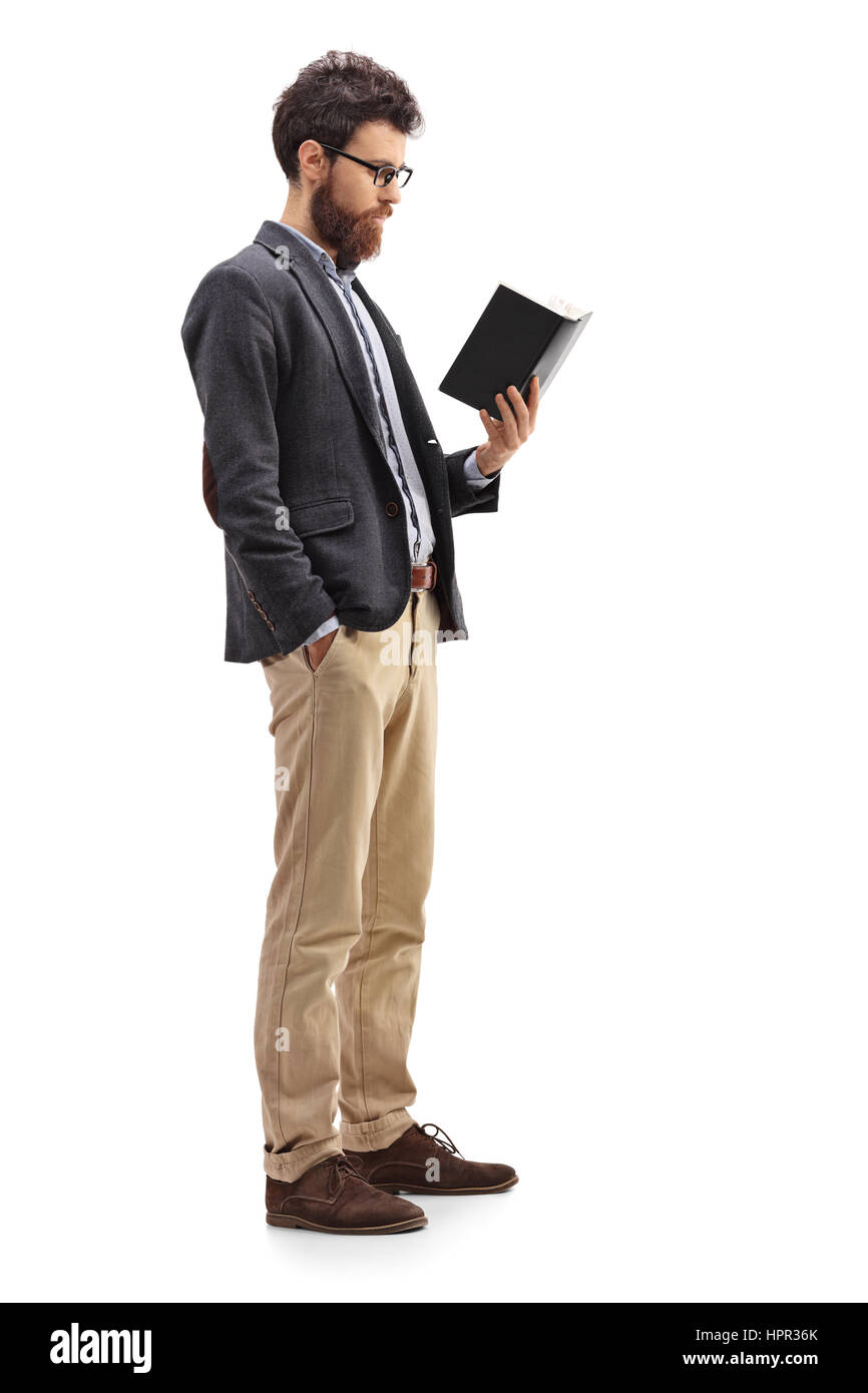 Full length profile shot of a male professor standing and reading a ...