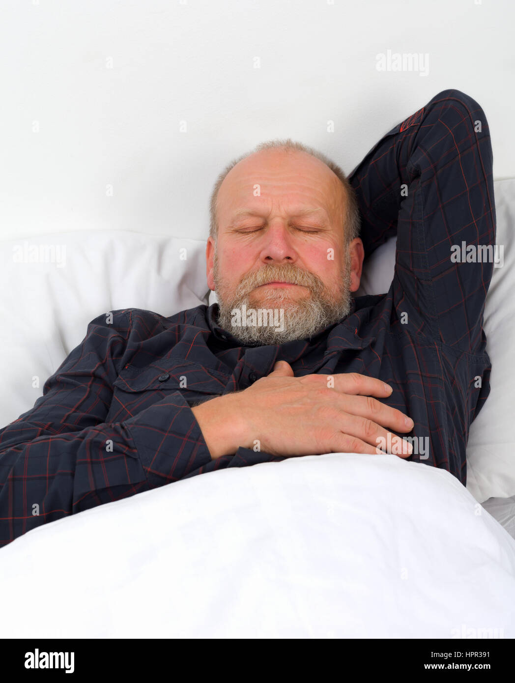 Napping pensioner hi-res stock photography and images - Alamy