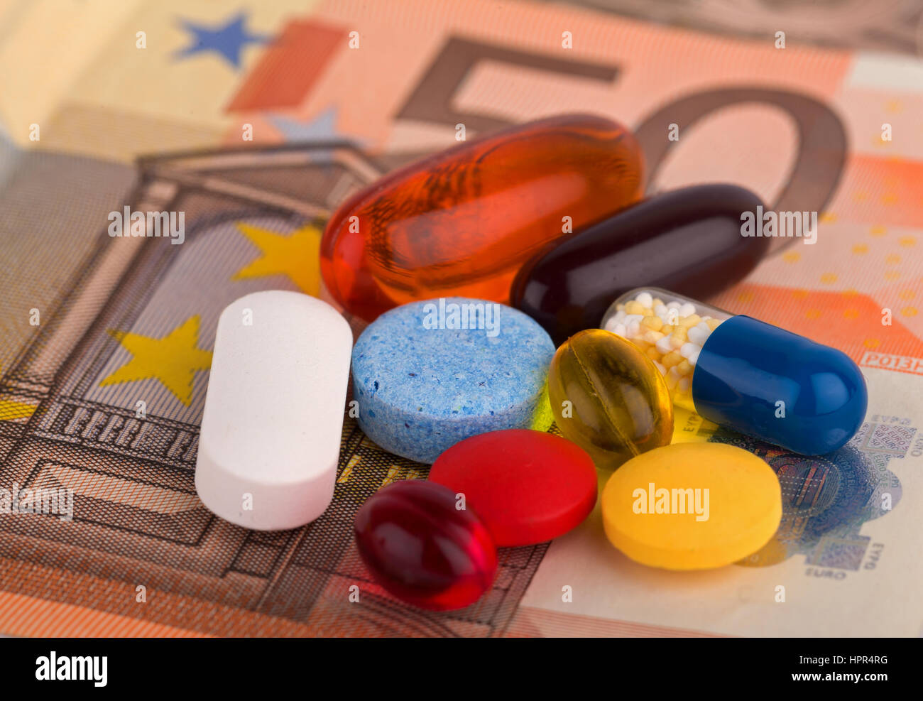 Colourful pills and capsules over 50 euro Stock Photo - Alamy