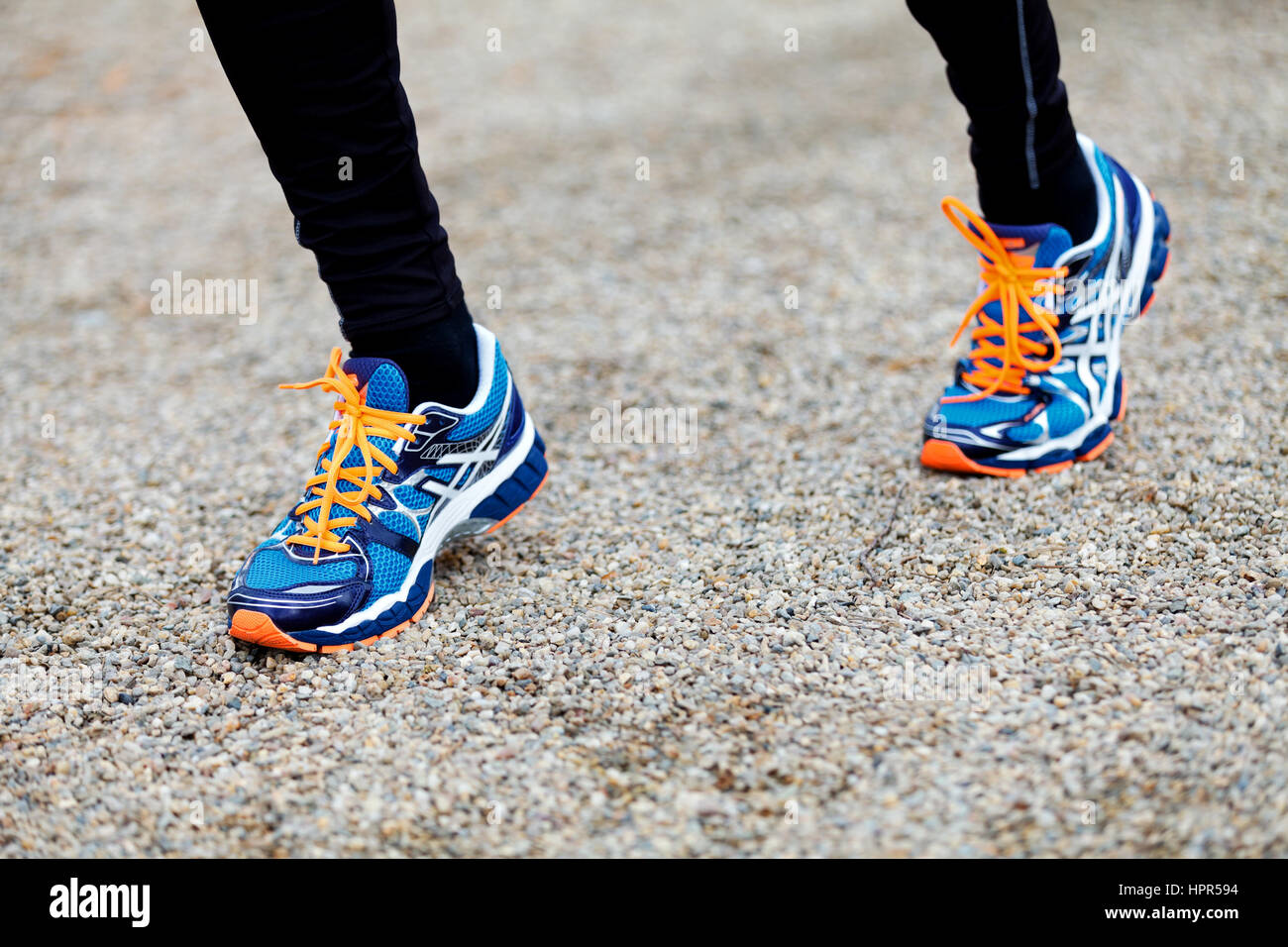 Picture of an athlete feet running on track Stock Photo - Alamy
