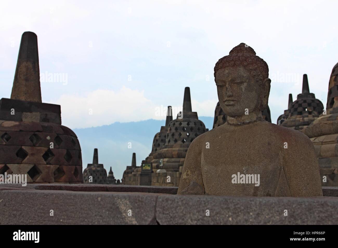 Buddha statue in stupa, Borobudur, near Yogyakarta, Java, Indonesia ...