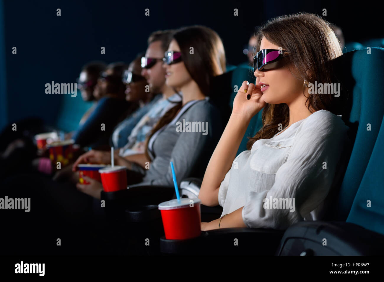 Cinema audience in 3d glasses hi-res stock photography and images - Alamy