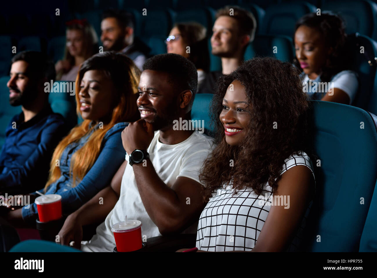 Our weekend tradition. Young happy people smiling joyfully while ...