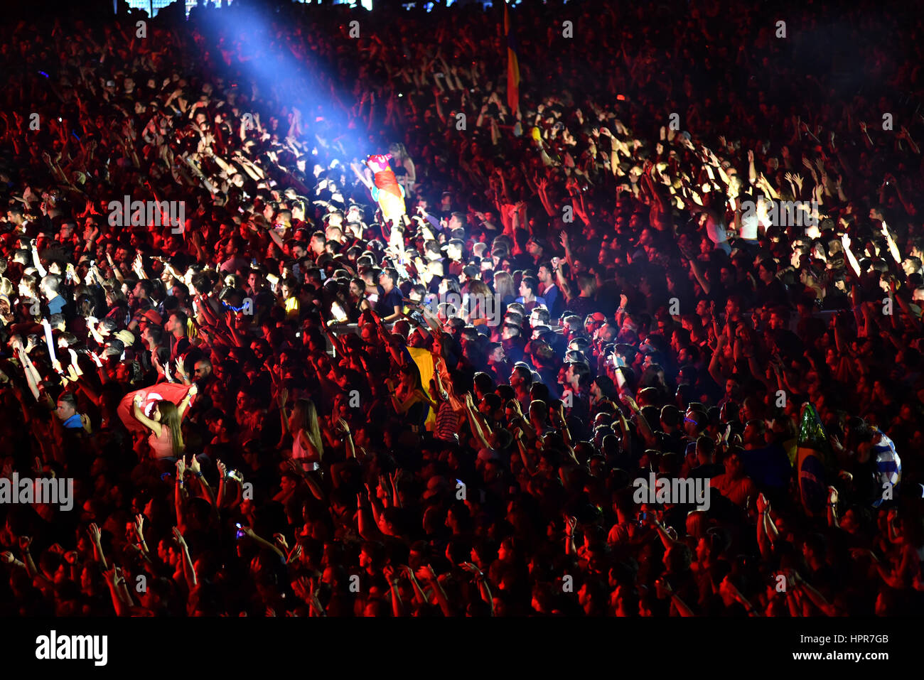 CLUJ NAPOCA, ROMANIA - JULY 8, 2016: Crowd having fun with raising hands at a Lost Frequencies ...