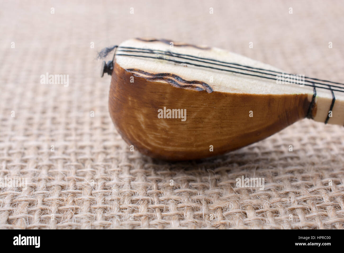 Model of Turkish musical instrument saz on a linen canvas Stock Photo ...