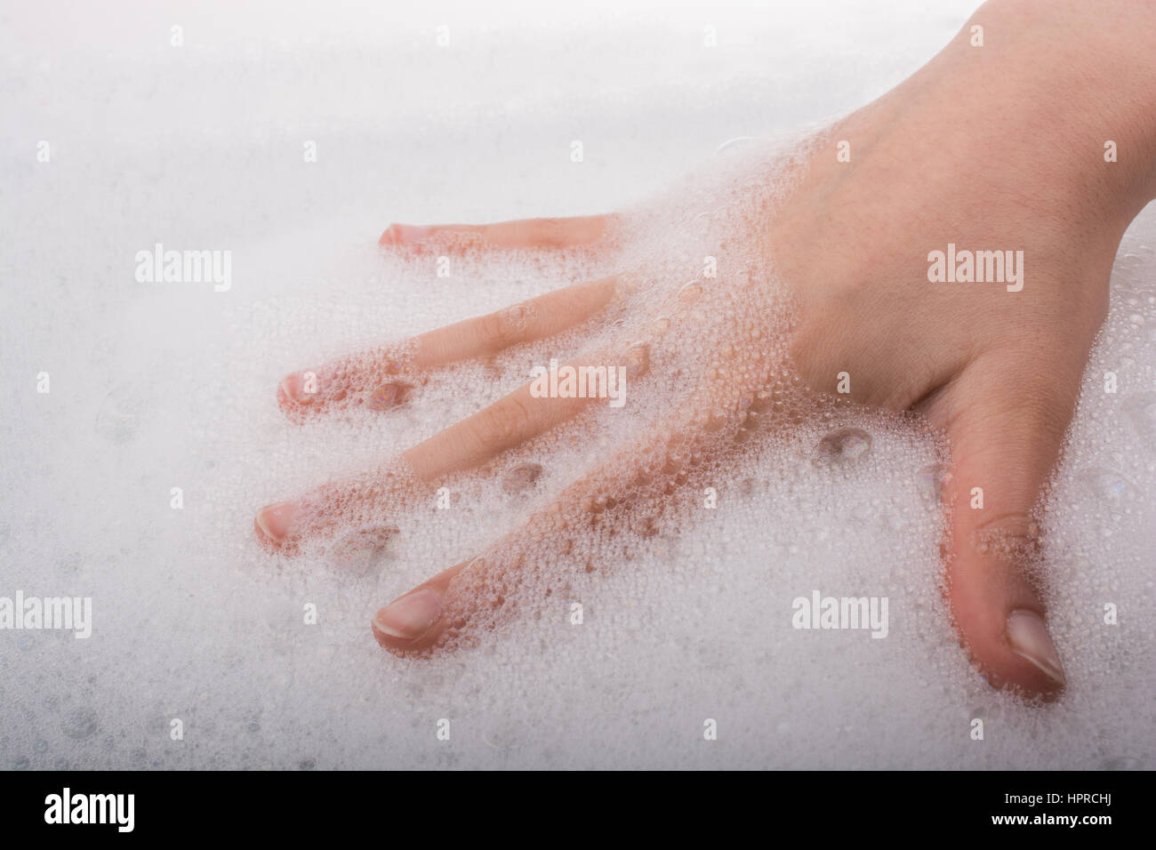 Hand washing and soap foam on a foamy background Stock Photo - Alamy