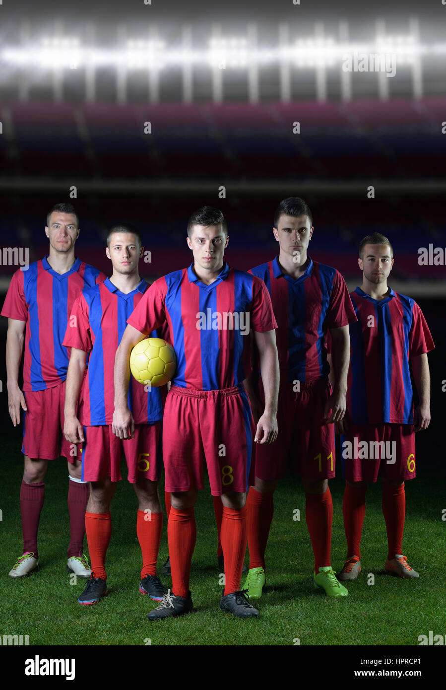 soccer players team group isolated on a stadium Stock Photo - Alamy