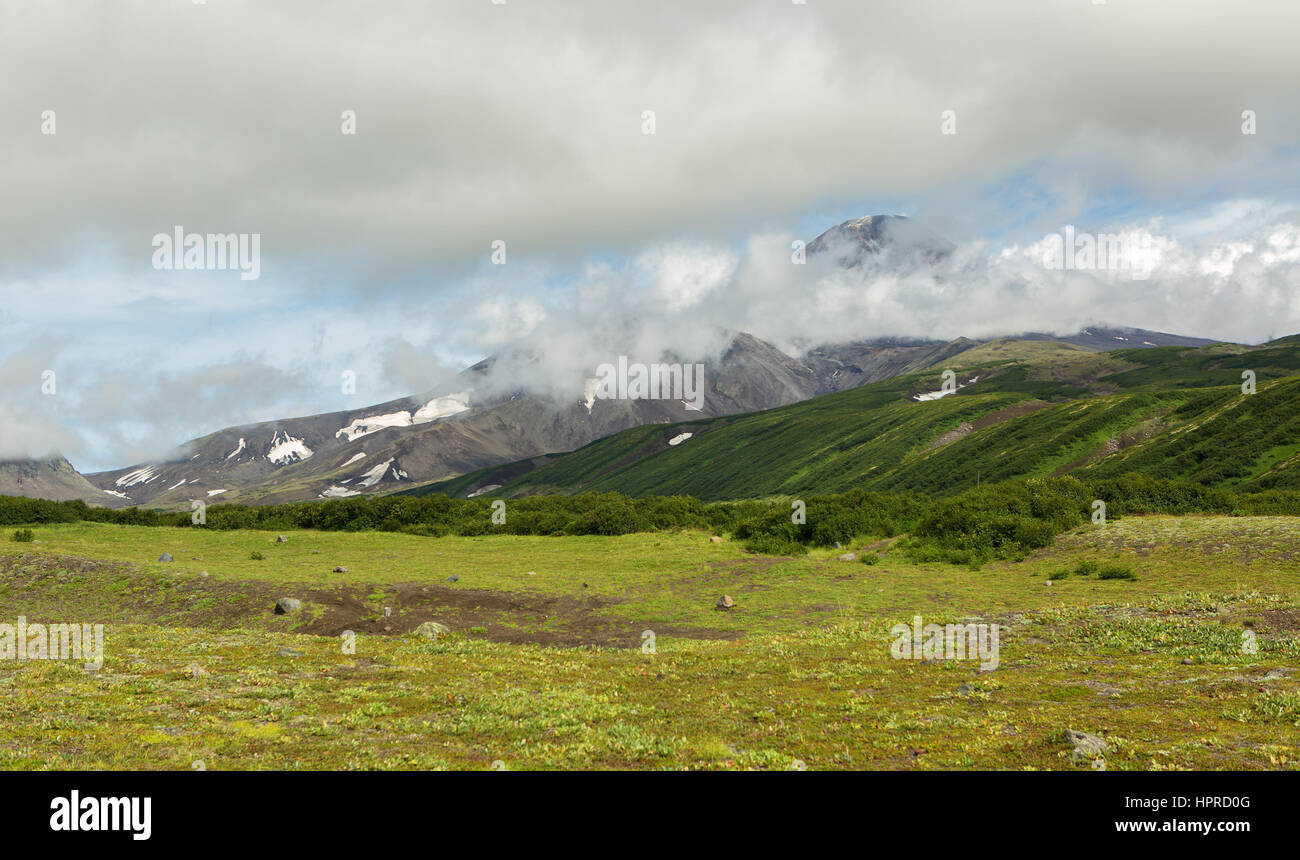Avacha Volcano or Avachinskaya Sopka in the clouds on the Kamchatka ...