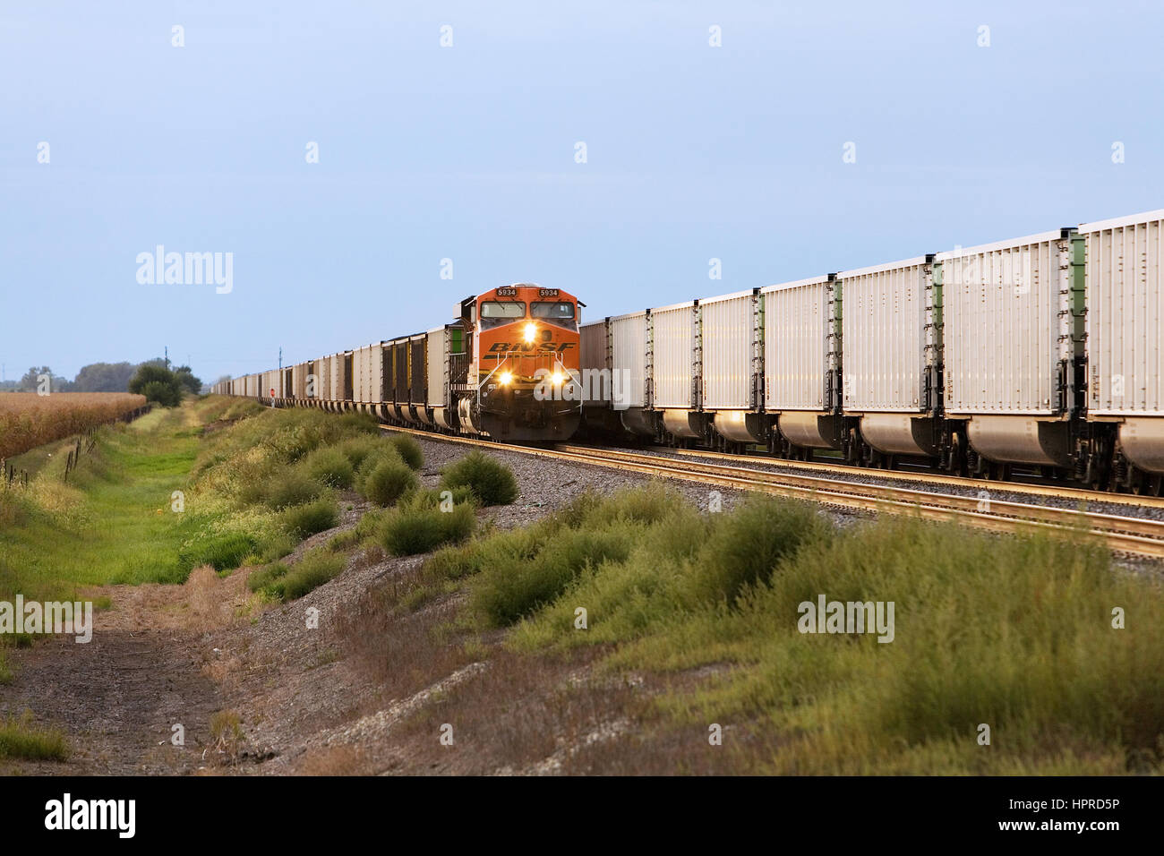 Two BNSF coal trains passing each other near Danville, Iowa Stock Photo - Alamy
