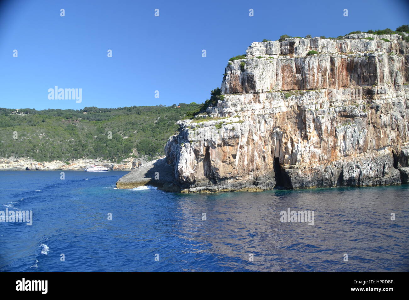 Rocks in Ionian sea at Corfu island in Greece Stock Photo - Alamy