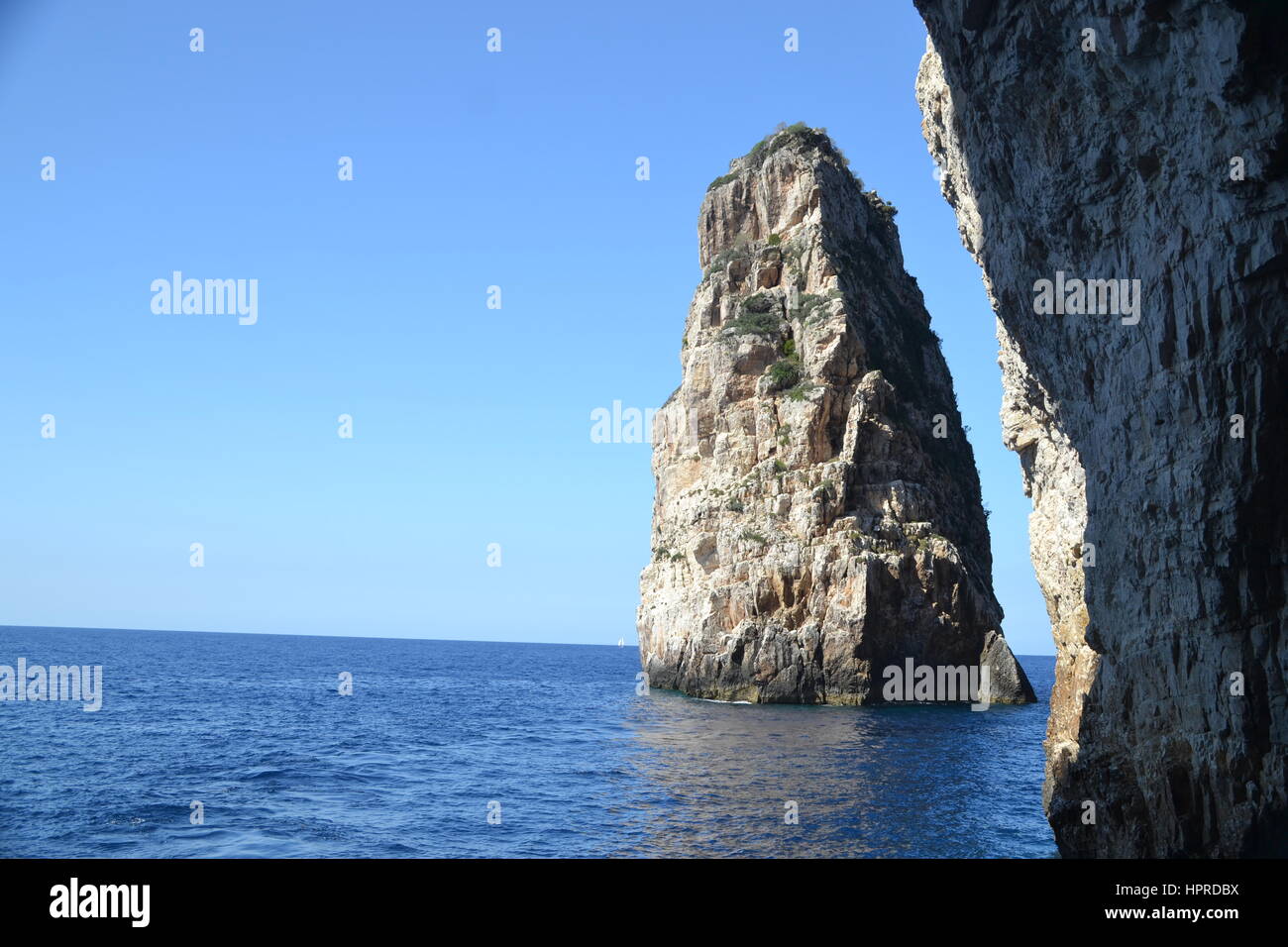 Rocks in Ionian sea at Corfu island in Greece Stock Photo - Alamy