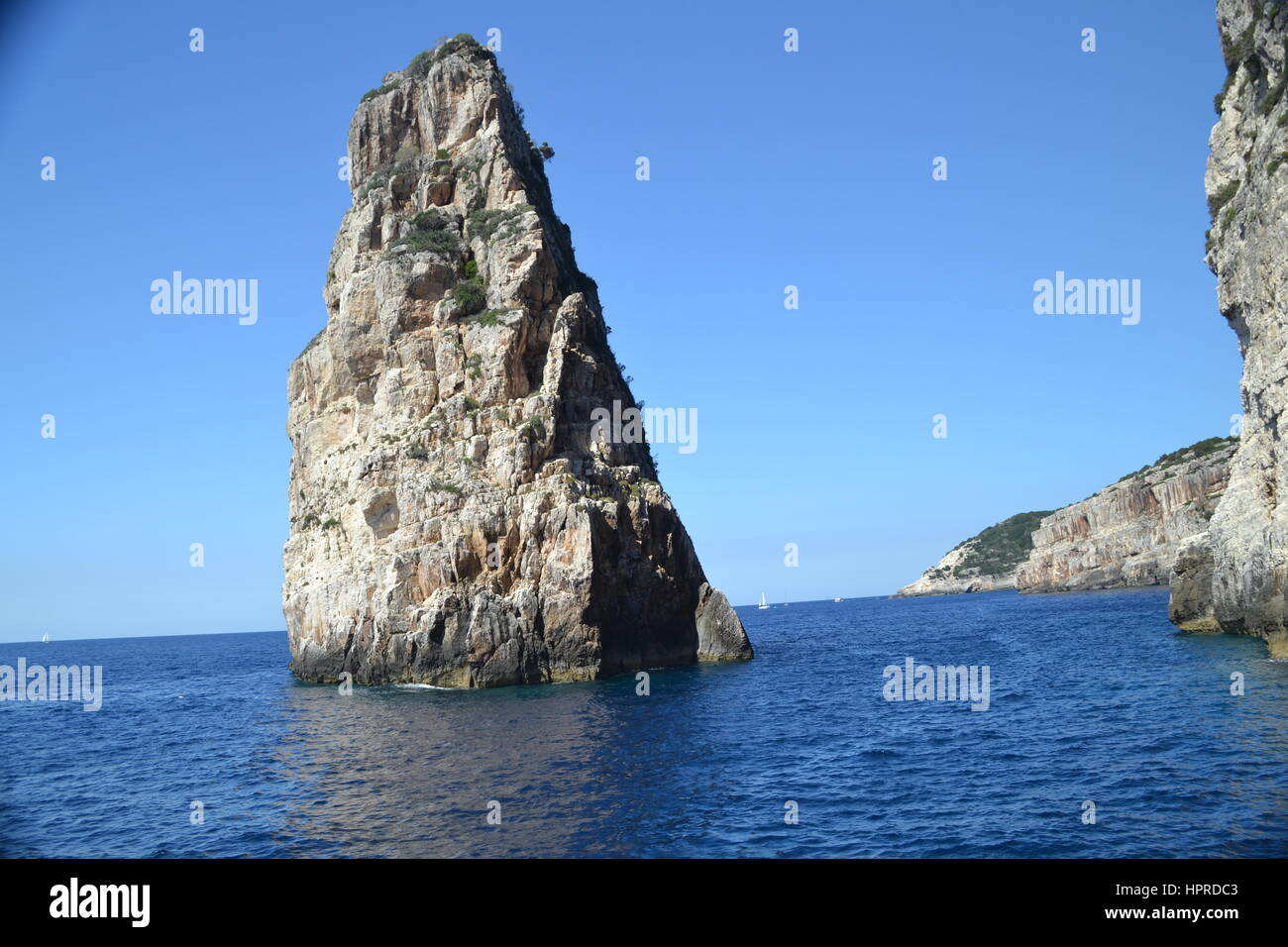 Rocks in Ionian sea at Corfu island in Greece Stock Photo - Alamy