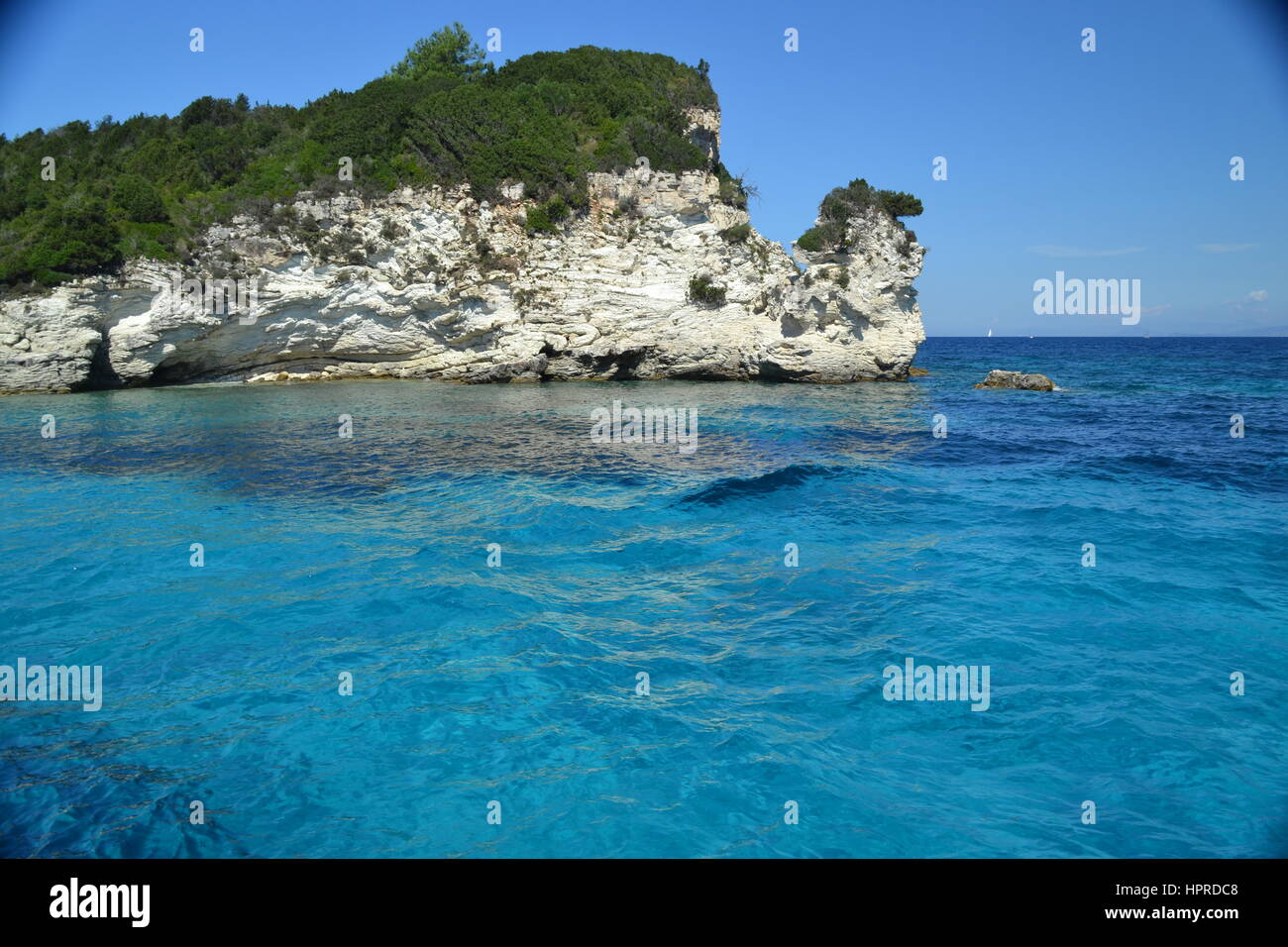 Rocks in Ionian sea at Corfu island in Greece Stock Photo - Alamy