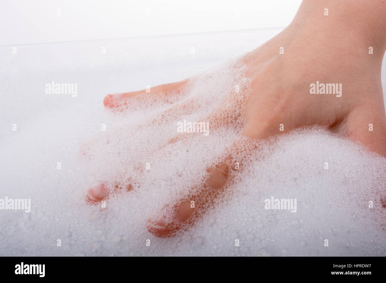 Hand washing and soap foam on a foamy background Stock Photo - Alamy