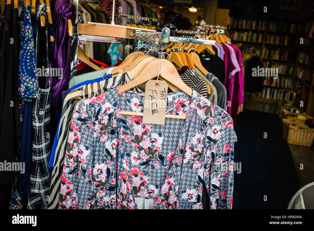 A Fat Face label adorns an extra small item in a charity thrift shop ...