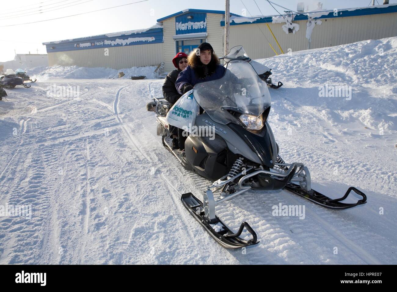 Snowmobile inuit hi-res stock photography and images - Alamy