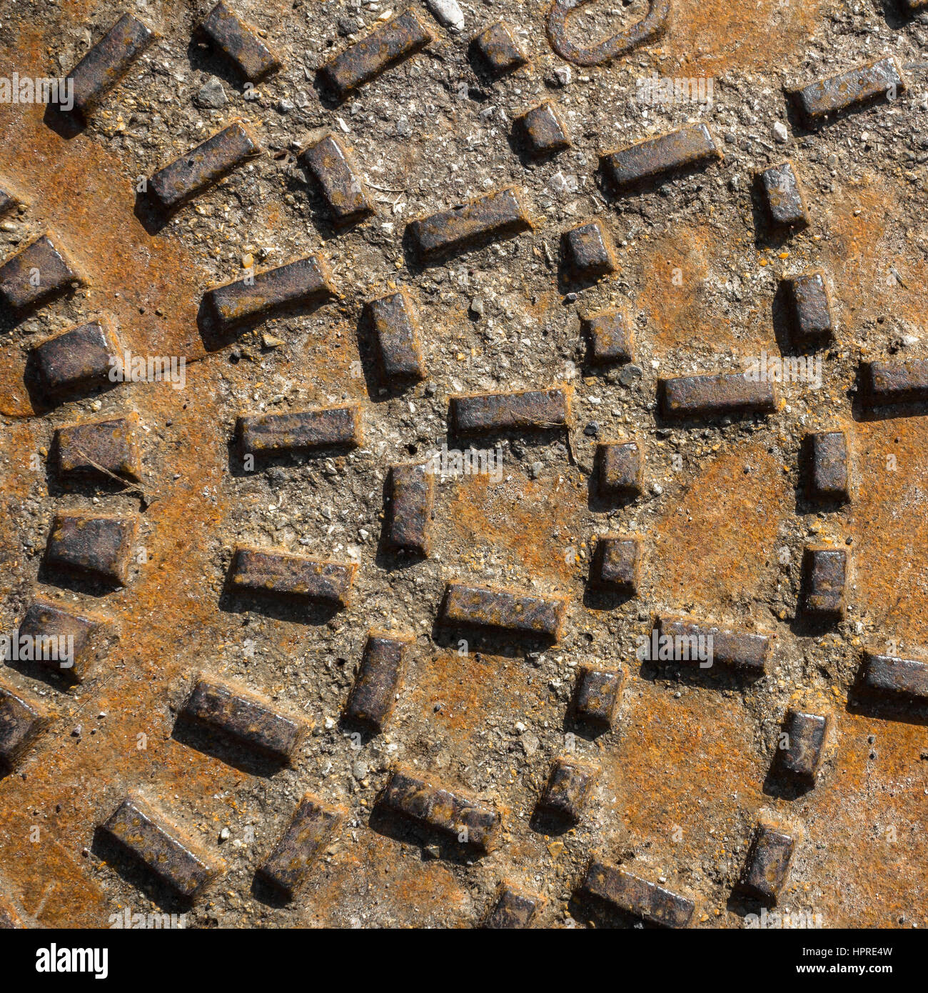 Background of metallic textures on sewer manhole Stock Photo - Alamy