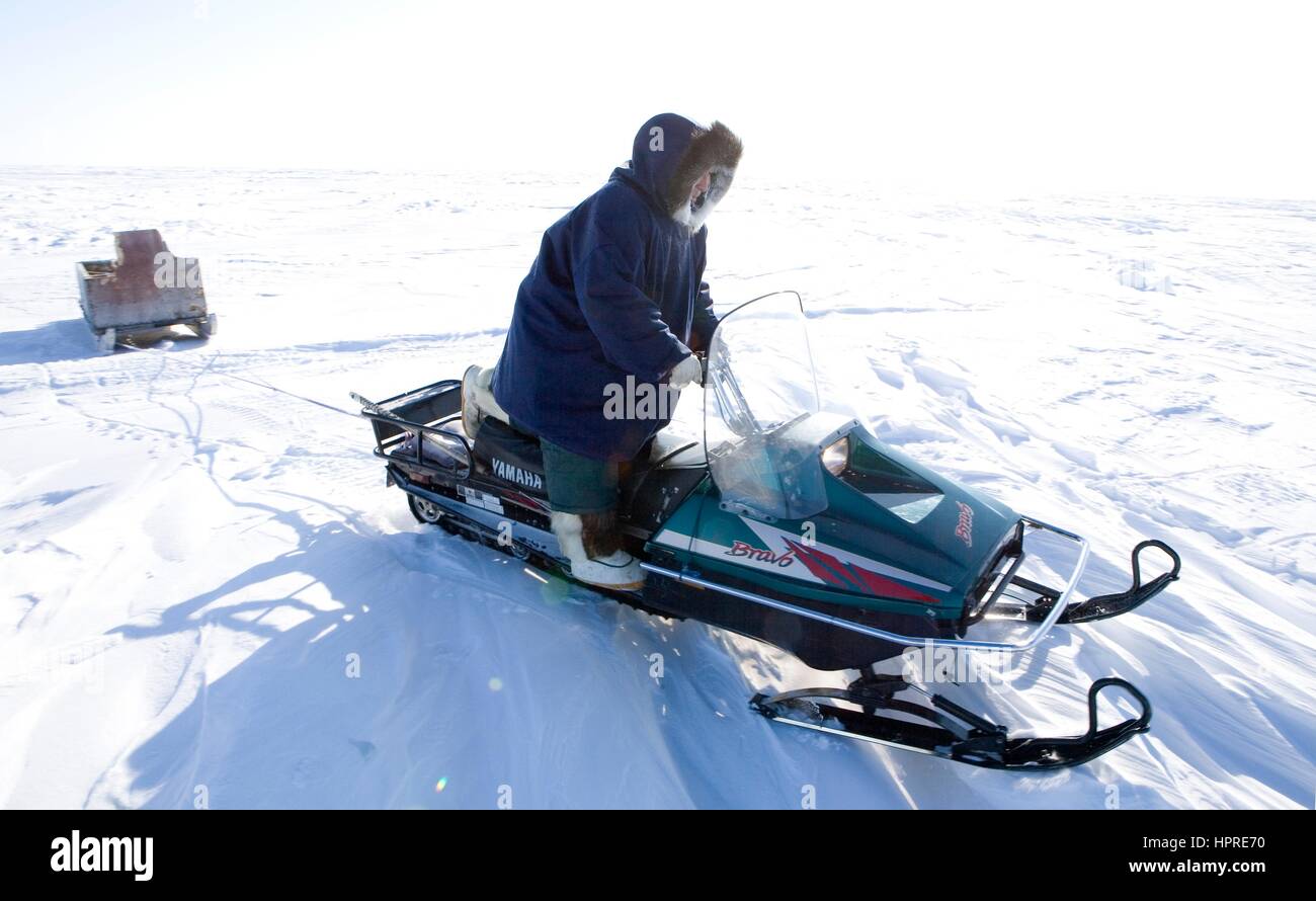 Snowmobile inuit hi-res stock photography and images - Alamy