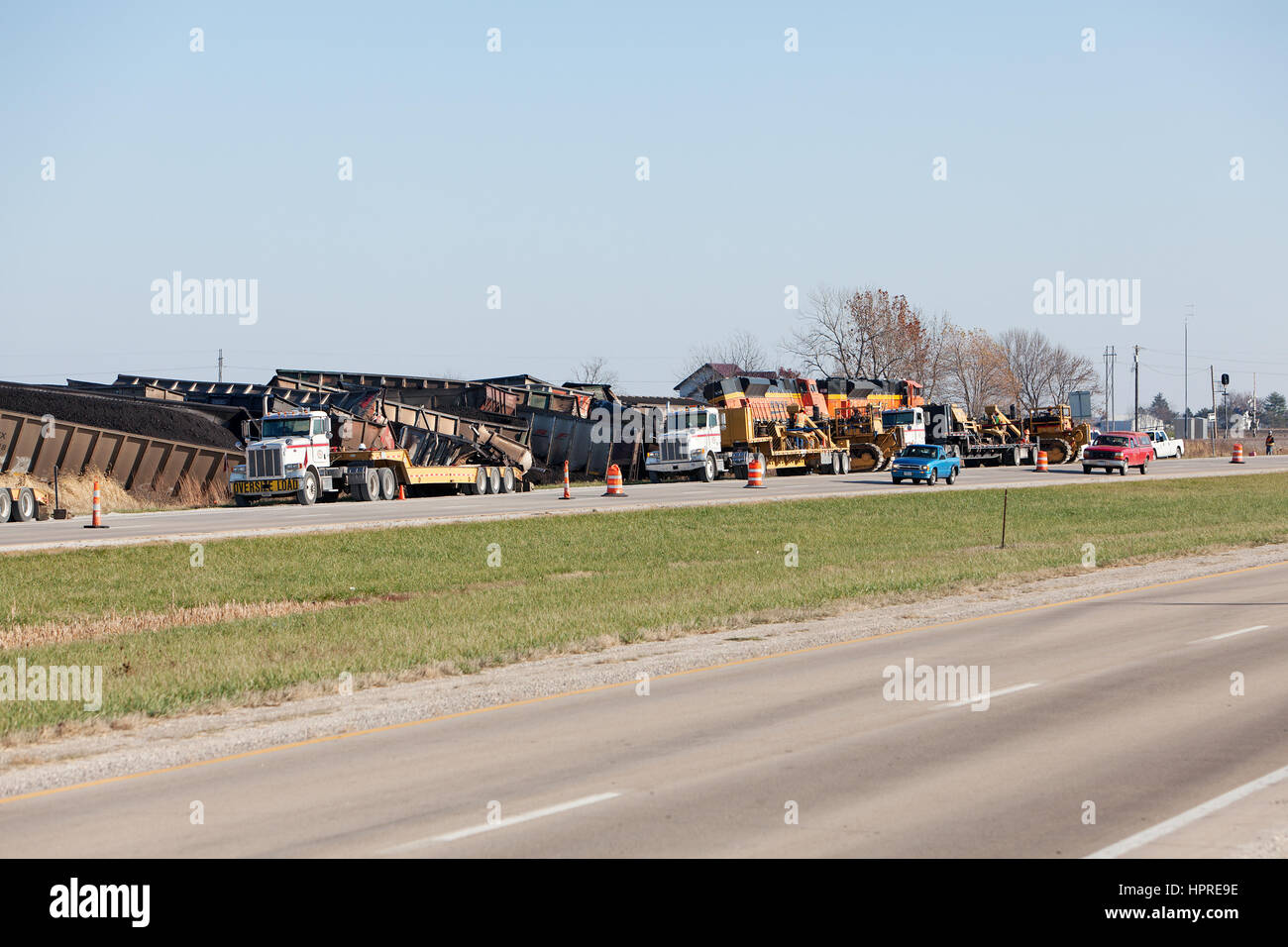 A BNSF freight train struck a road grader at a crossing in Danville ...