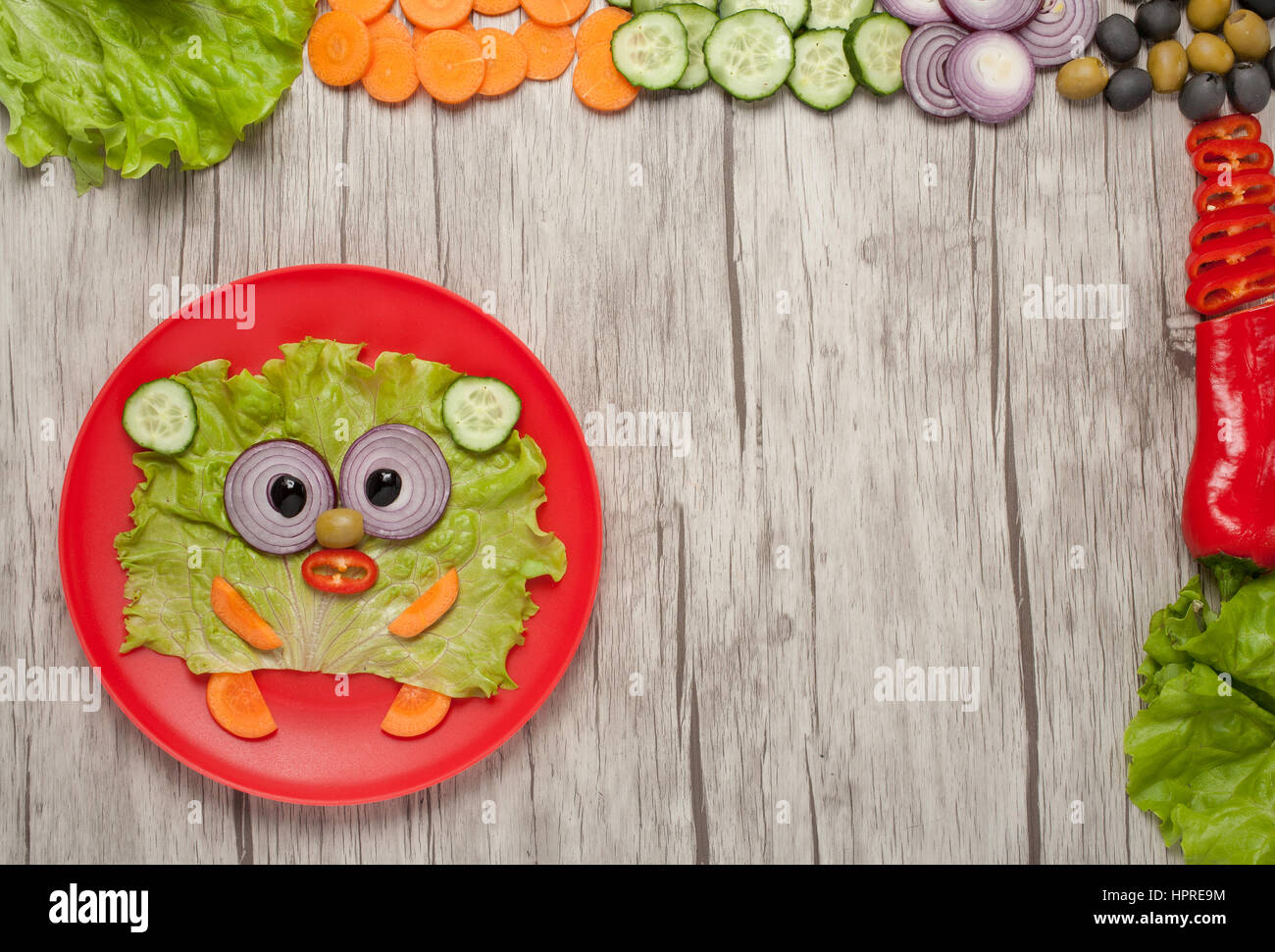 Vegetable bear made on plate and table with ingredients Stock Photo - Alamy