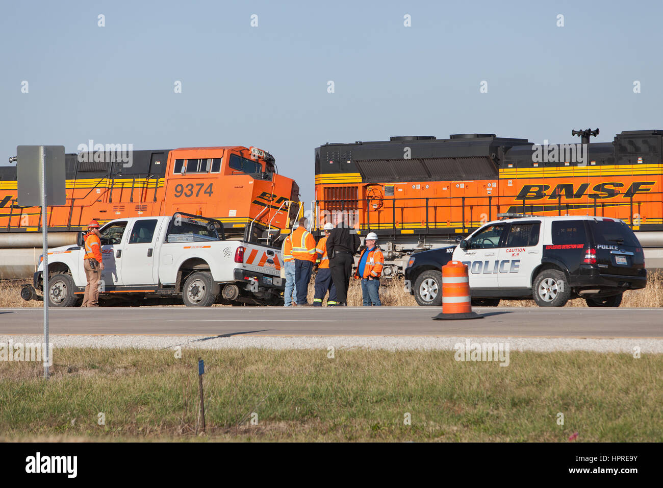 A BNSF freight train struck a road grader at a crossing in Danville ...