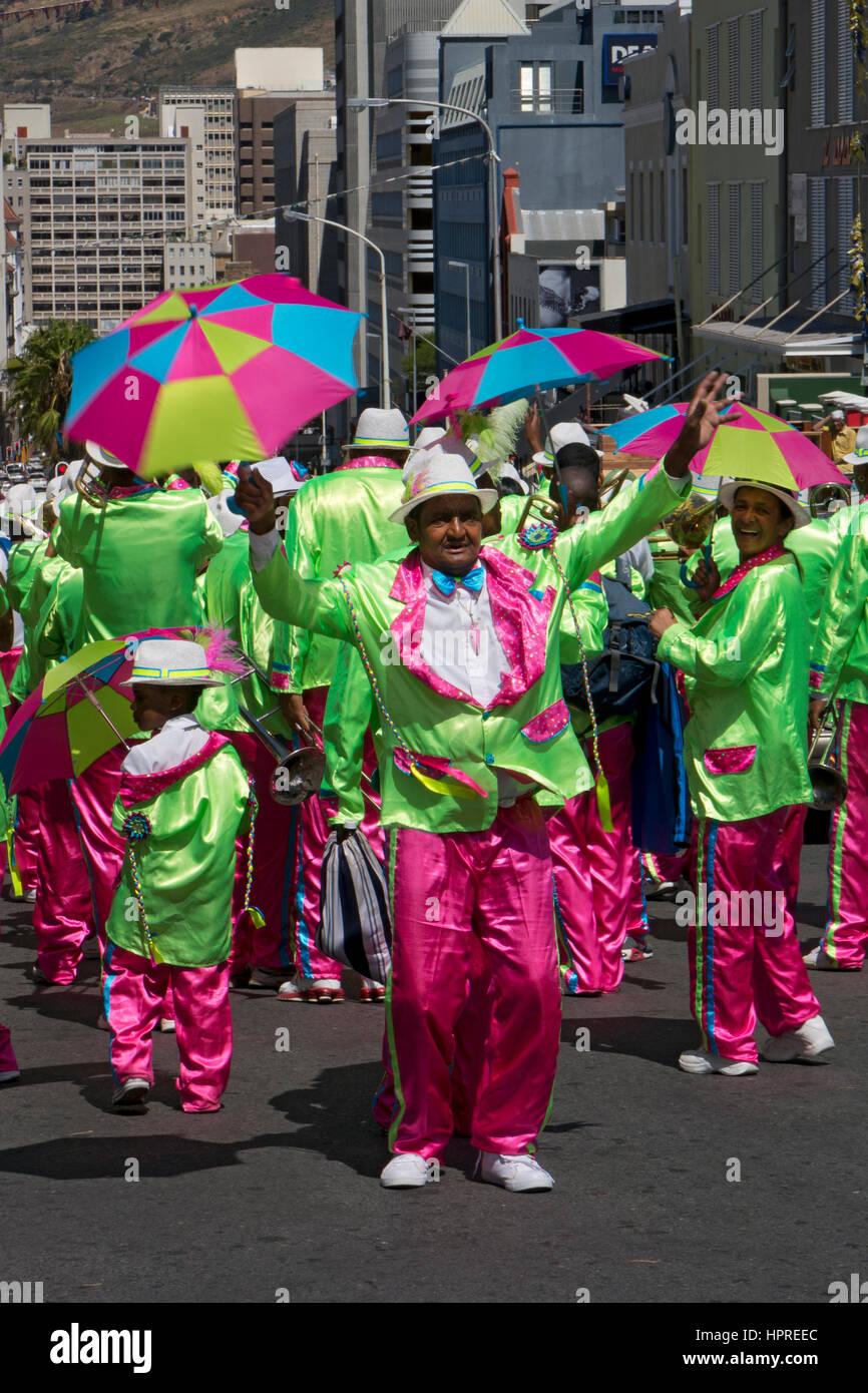Street parade festival with music band of minstrels and dancers in ...