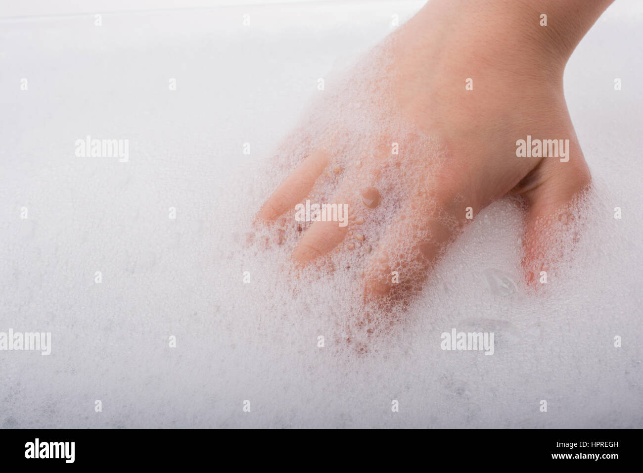 Hand washing and soap foam on a foamy background Stock Photo - Alamy