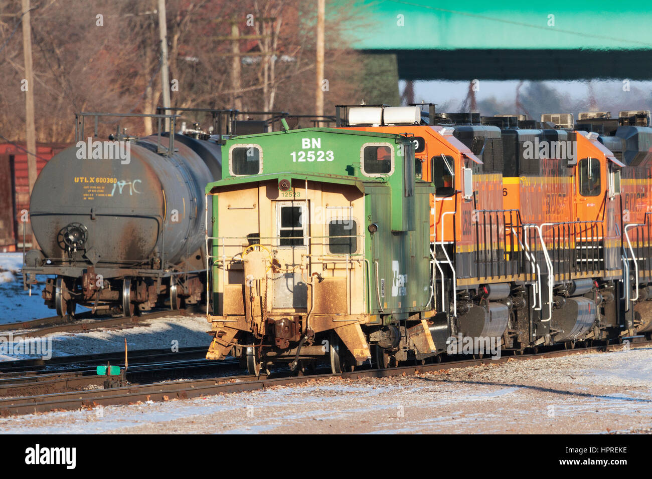 A caboose and locomotives parked at a BNSF rail yard in Keokuk, Iowa ...