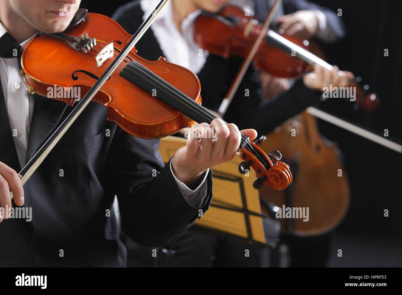Symphony music, violinist at concert, hand close up Stock Photo - Alamy