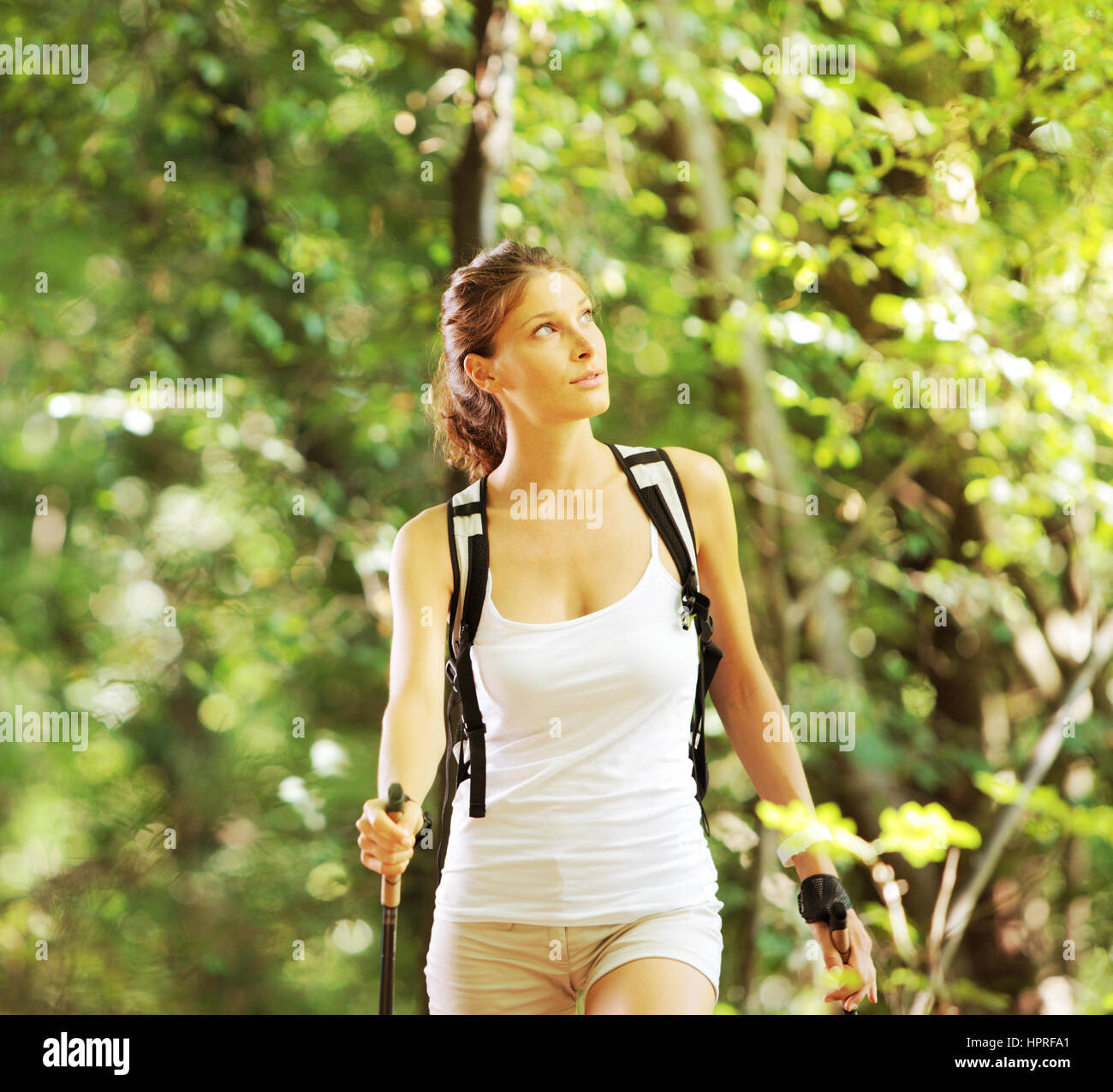 Woman walking cross country in forest Stock Photo - Alamy Woman walking cross country in forest Stock Photo - Alamy
