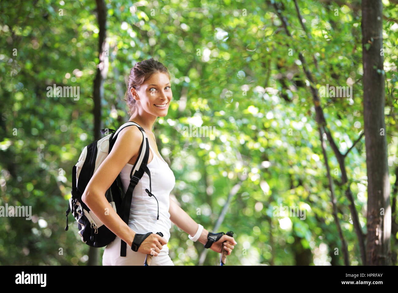 Woman walking cross country in forest Stock Photo - Alamy Woman walking cross country in forest Stock Photo - Alamy