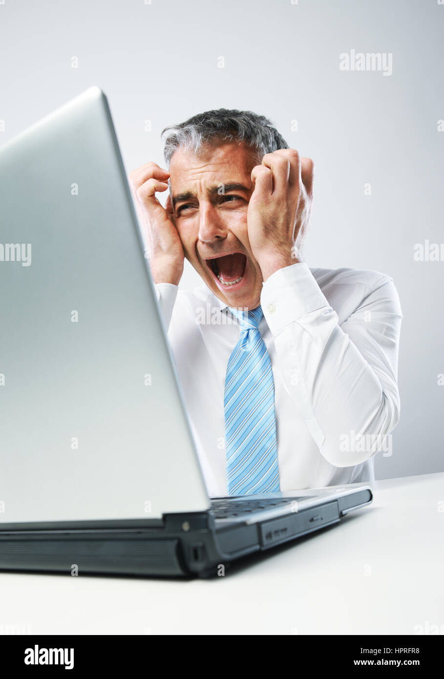 Stressed Man At Computer