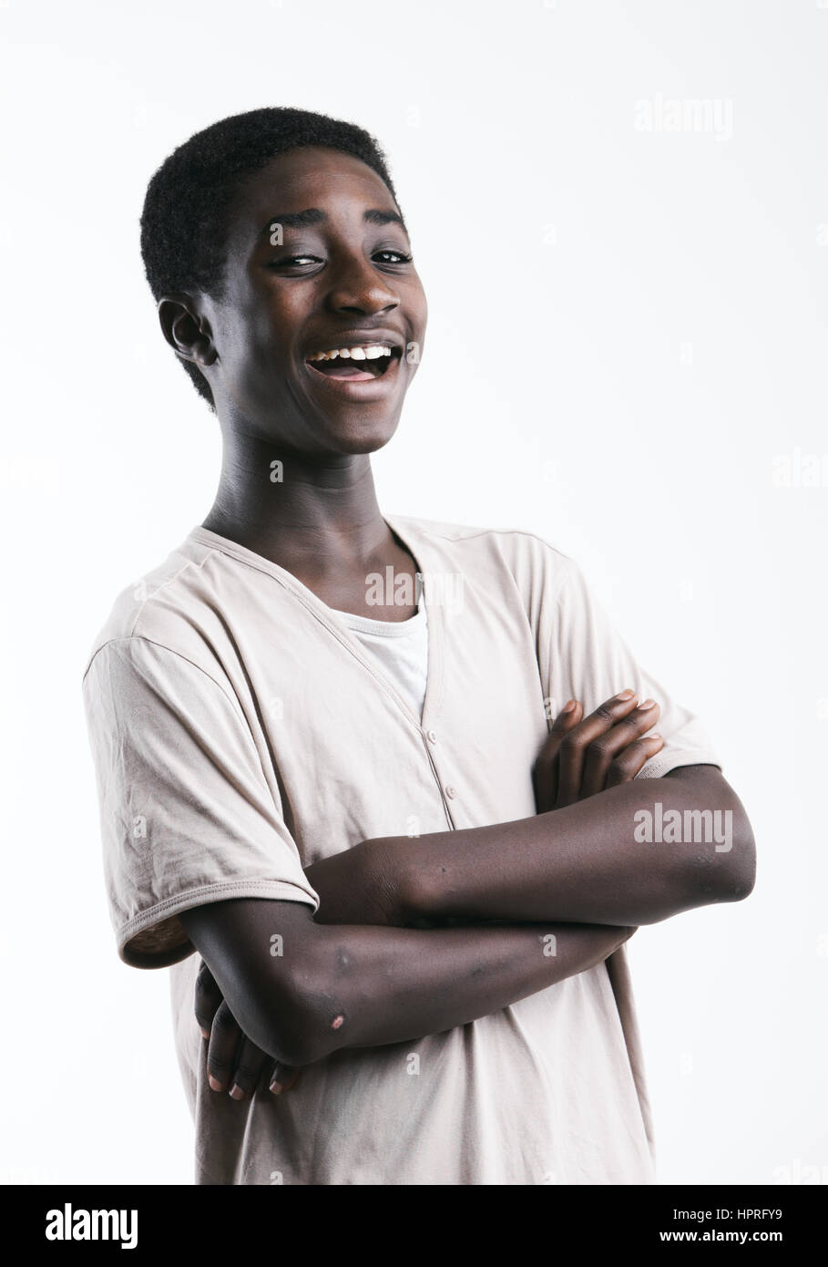 Portrait of an happines African boy on white background Stock Photo - Alamy