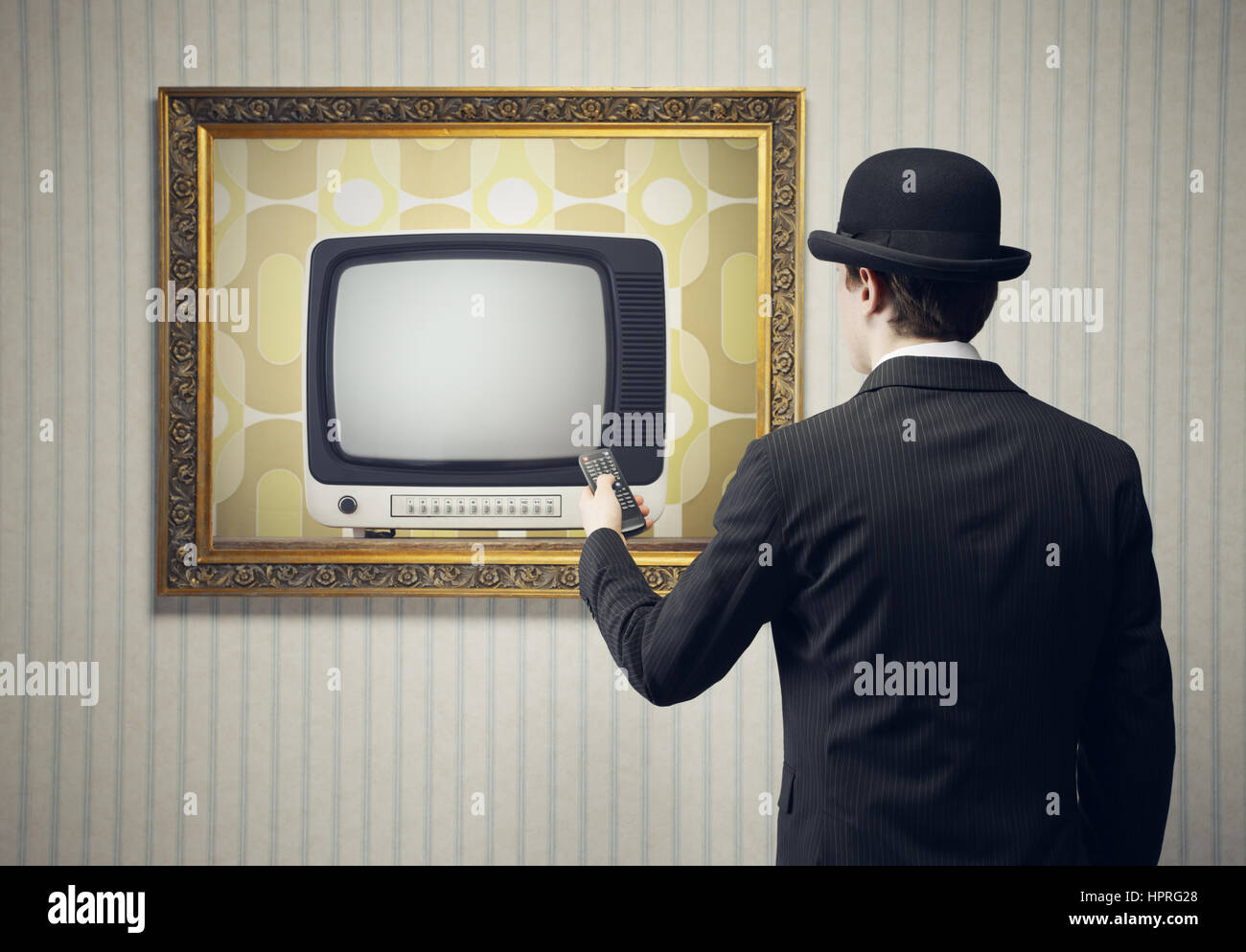 Man holding tv remote hi-res stock photography and images - Alamy