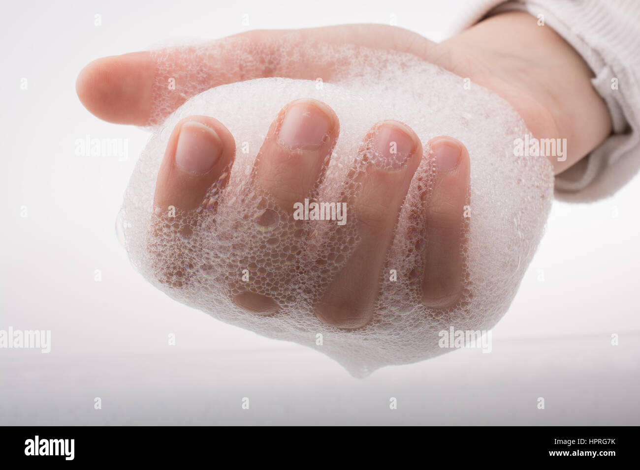 Hand washing and soap foam on a foamy background Stock Photo - Alamy
