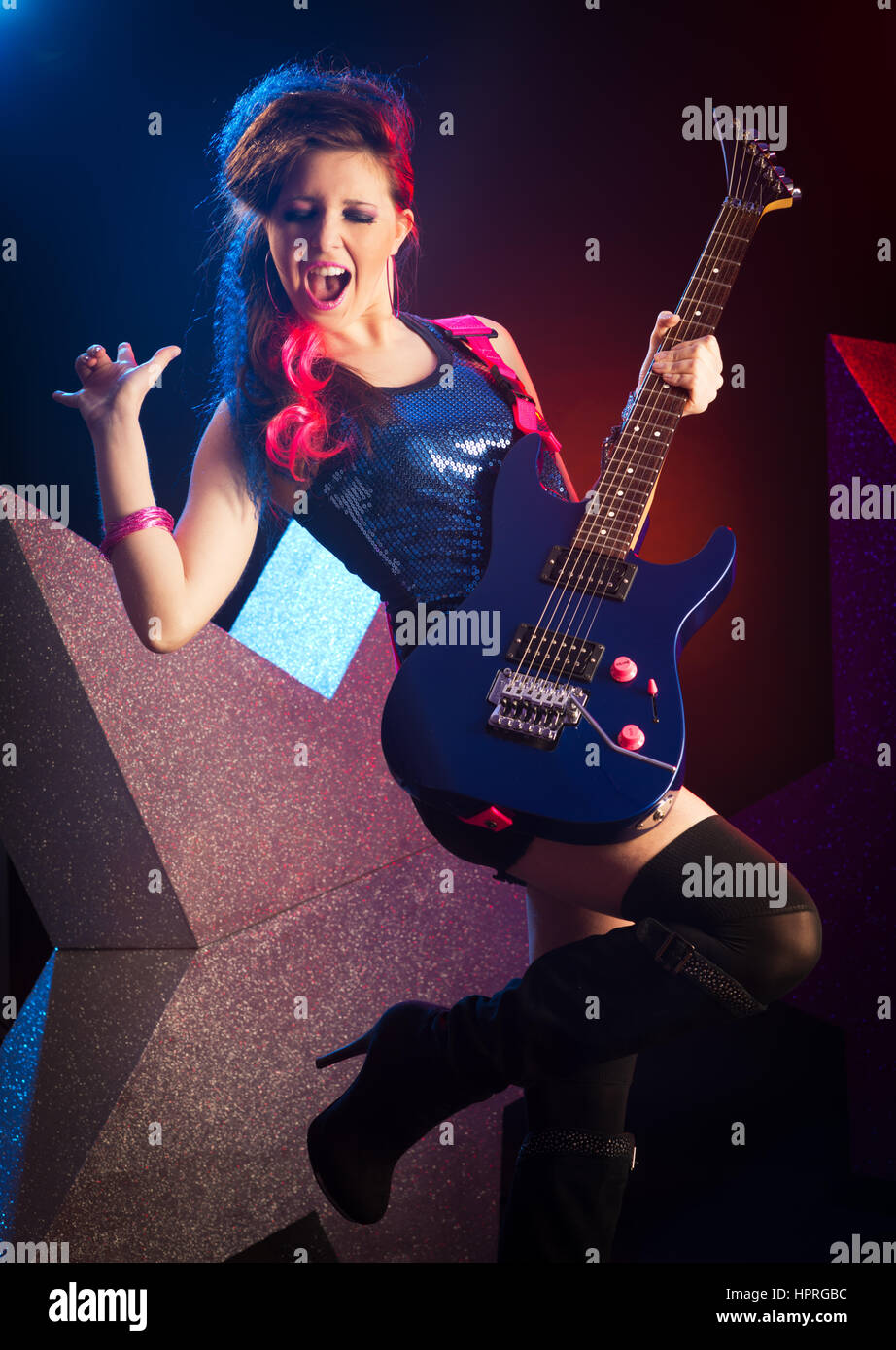 Teenager singing on stage talent show hi-res stock photography and ...